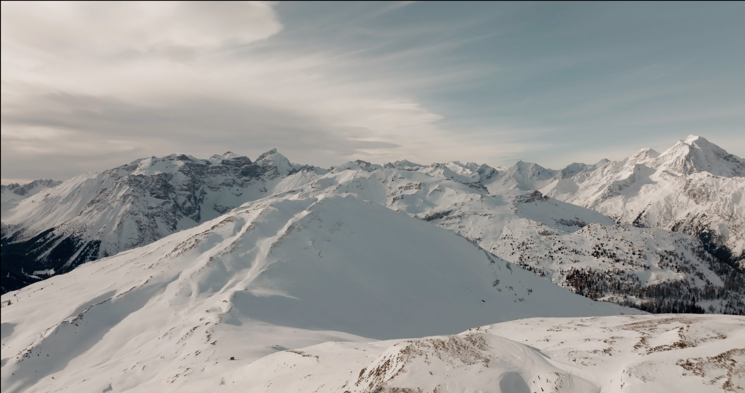 First snow in alpine valley | Stock footage | aerial-footage.com